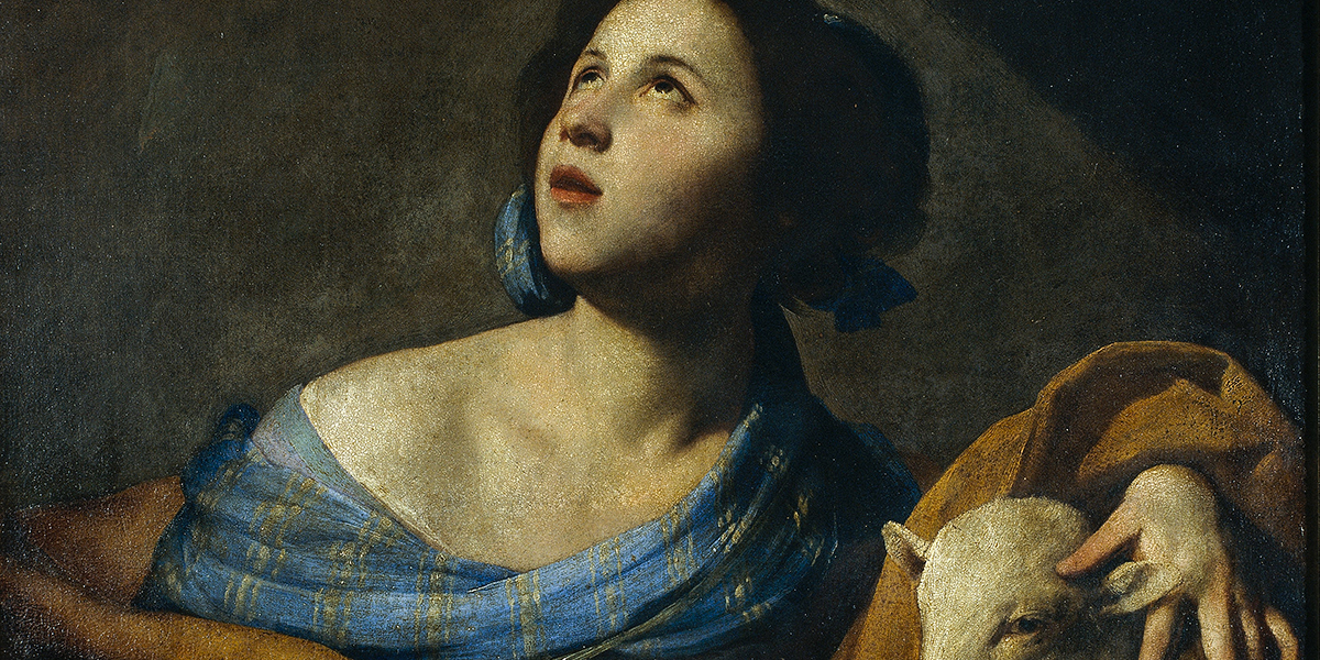 Why is St. Agnes depicted with a lamb?