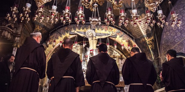 At the Altar of Crucifixion in the Holy Sepulchre