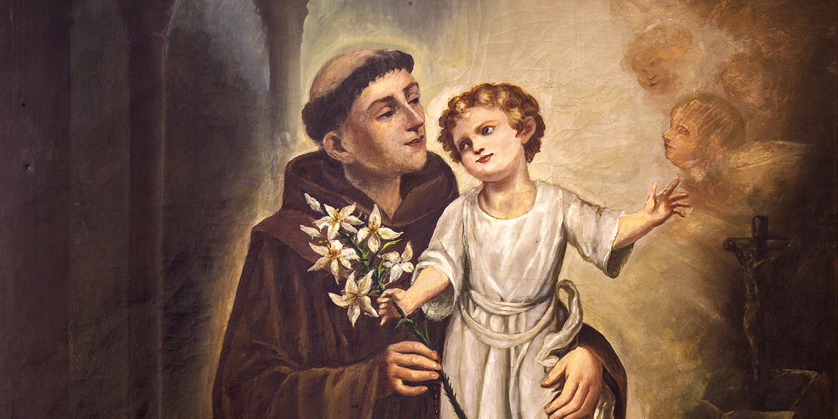 Why is St. Anthony of Padua holding the Child Jesus?