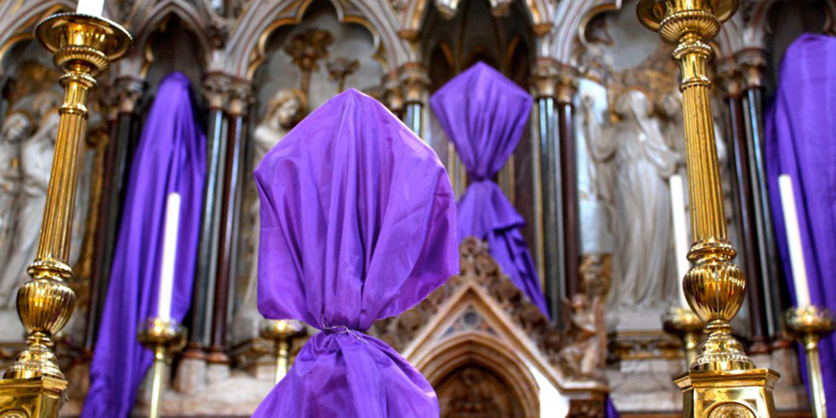 Why do Catholics cover crucifixes and statues during Lent?