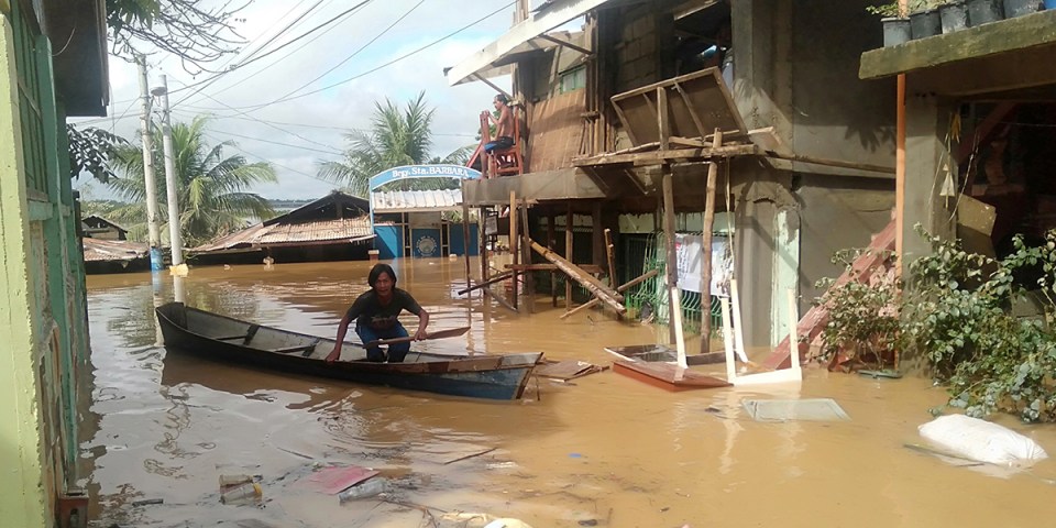 Record-breaking floods in Philippines displace thousands