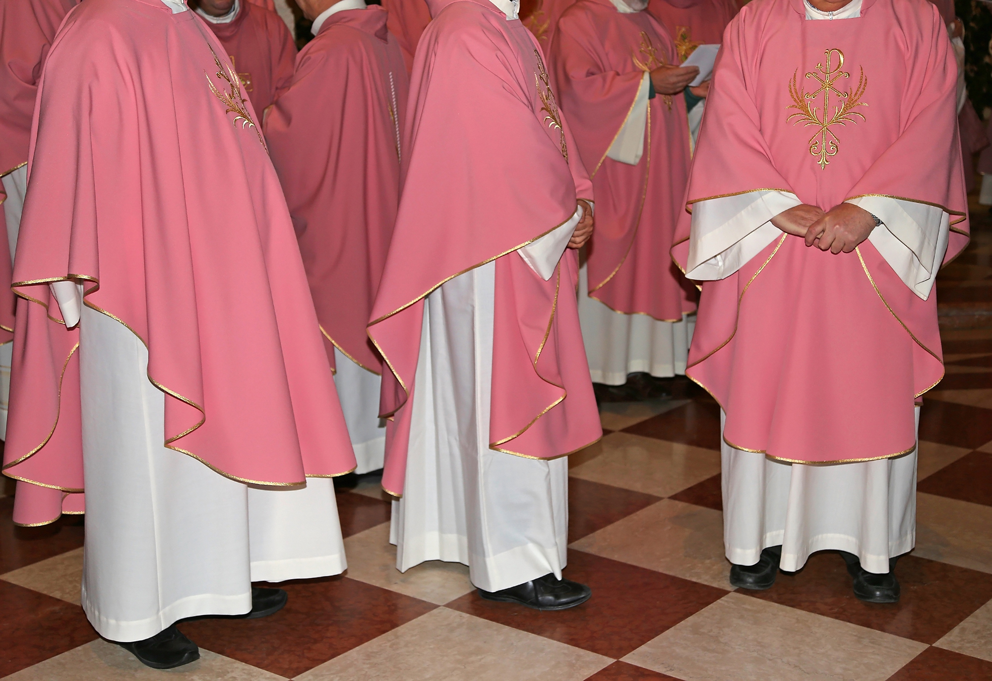 Why priests wear "rose" and not pink vestments