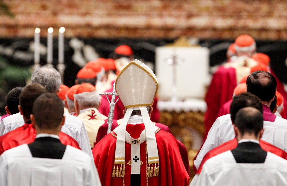 What is the difference between a cardinal bishop, priest and deacon?