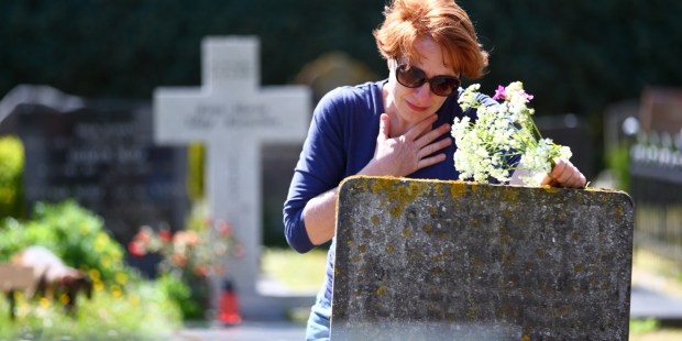 Catholic prayer while visiting a cemetery