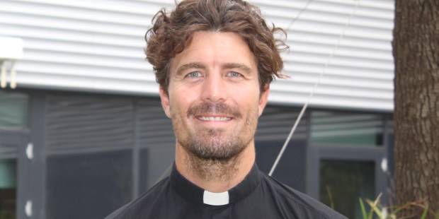 Daring priest saves man from shark attack and wins prestigious award