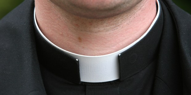 What is a parochial vicar in the Catholic Church?