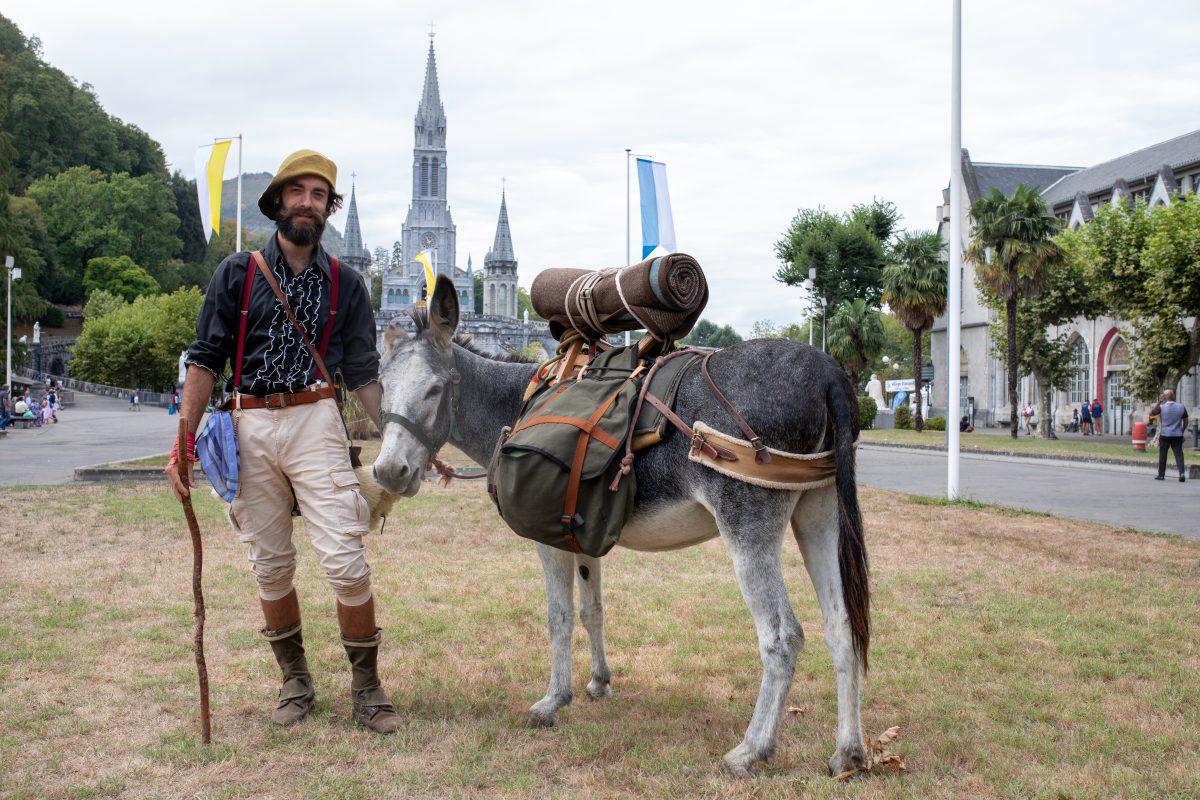 A man and his donkey make a pilgrimage to Lourdes ... 19th-century-style