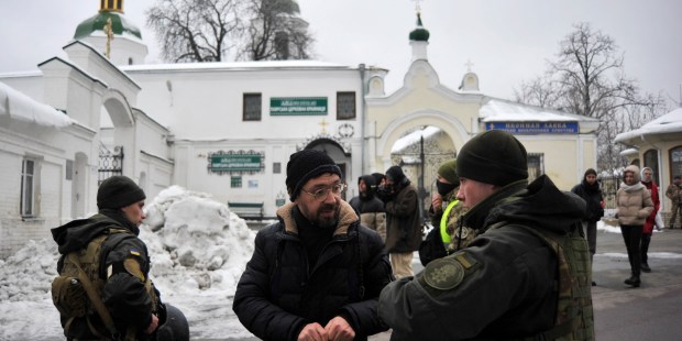Ukrainian officials raid Orthodox churches, seeking saboteurs