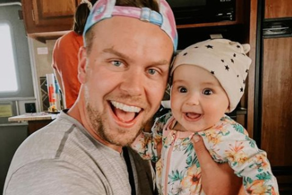 Dad finishes Vancouver marathon with baby girl in his arms