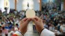 How long should you pray after receiving Holy Communion?