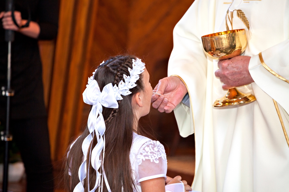 Receiving Holy Communion Cheridan And Sebastian Receive Holy Communion