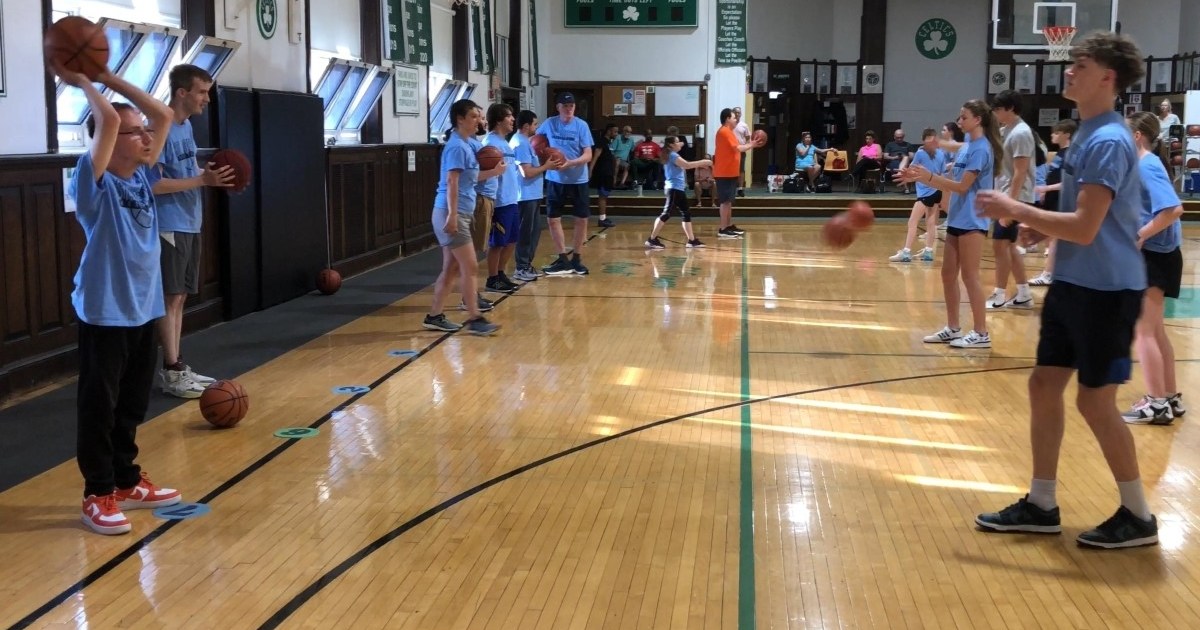 Joyous basketball clinic for adults with autism