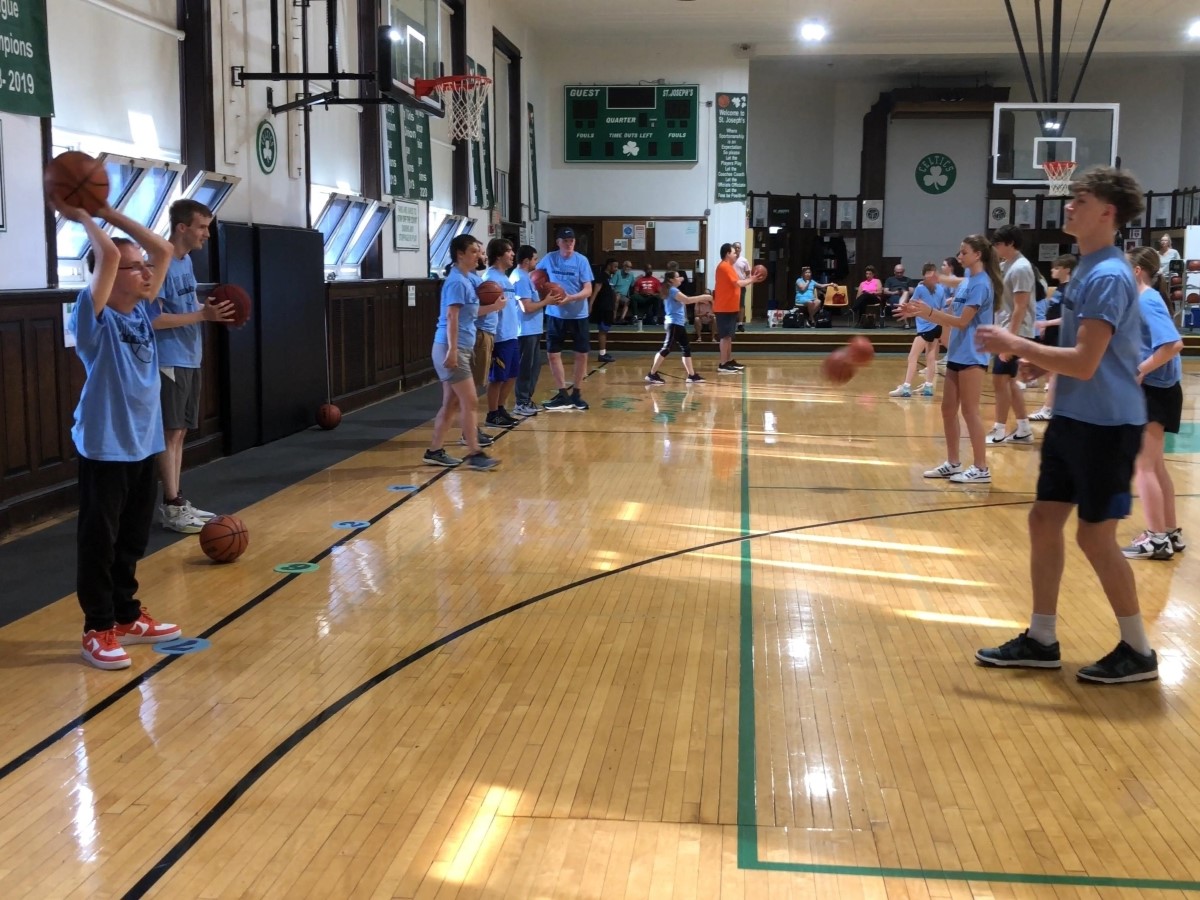 Joyous basketball clinic for adults with autism