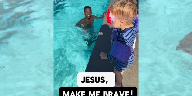 A lesson in confidence from a little guy in arm floaties