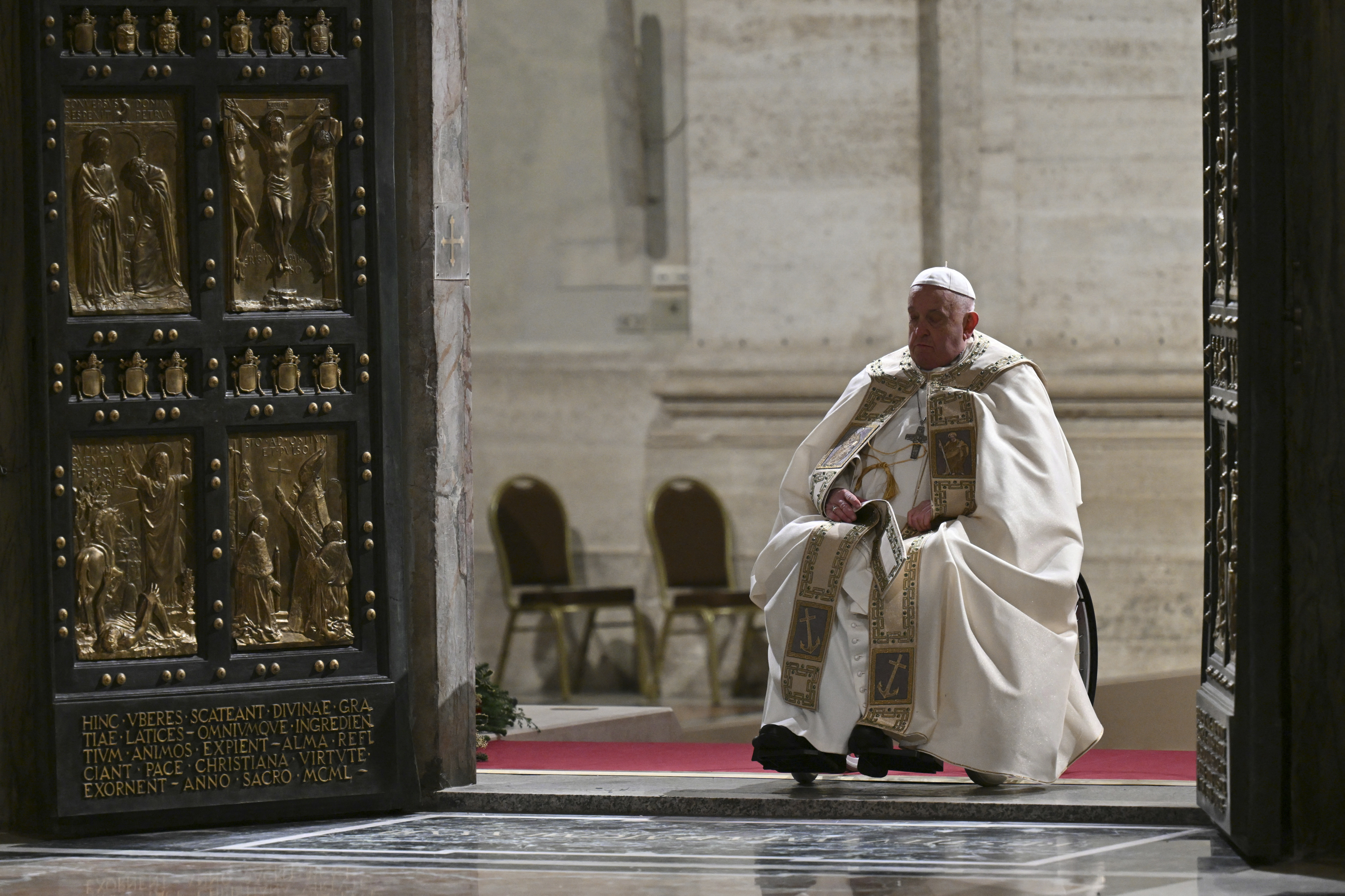 Pope opens first of Rome's five Holy Doors