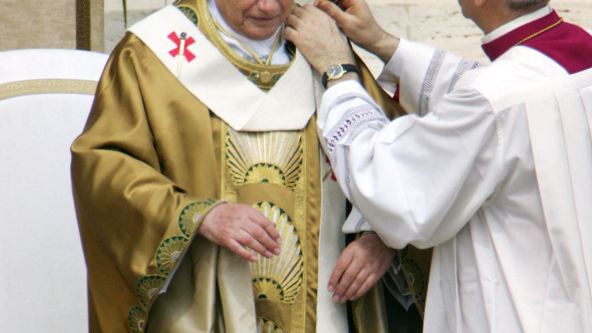 The bishop's pallium reminds him of the weight of his office