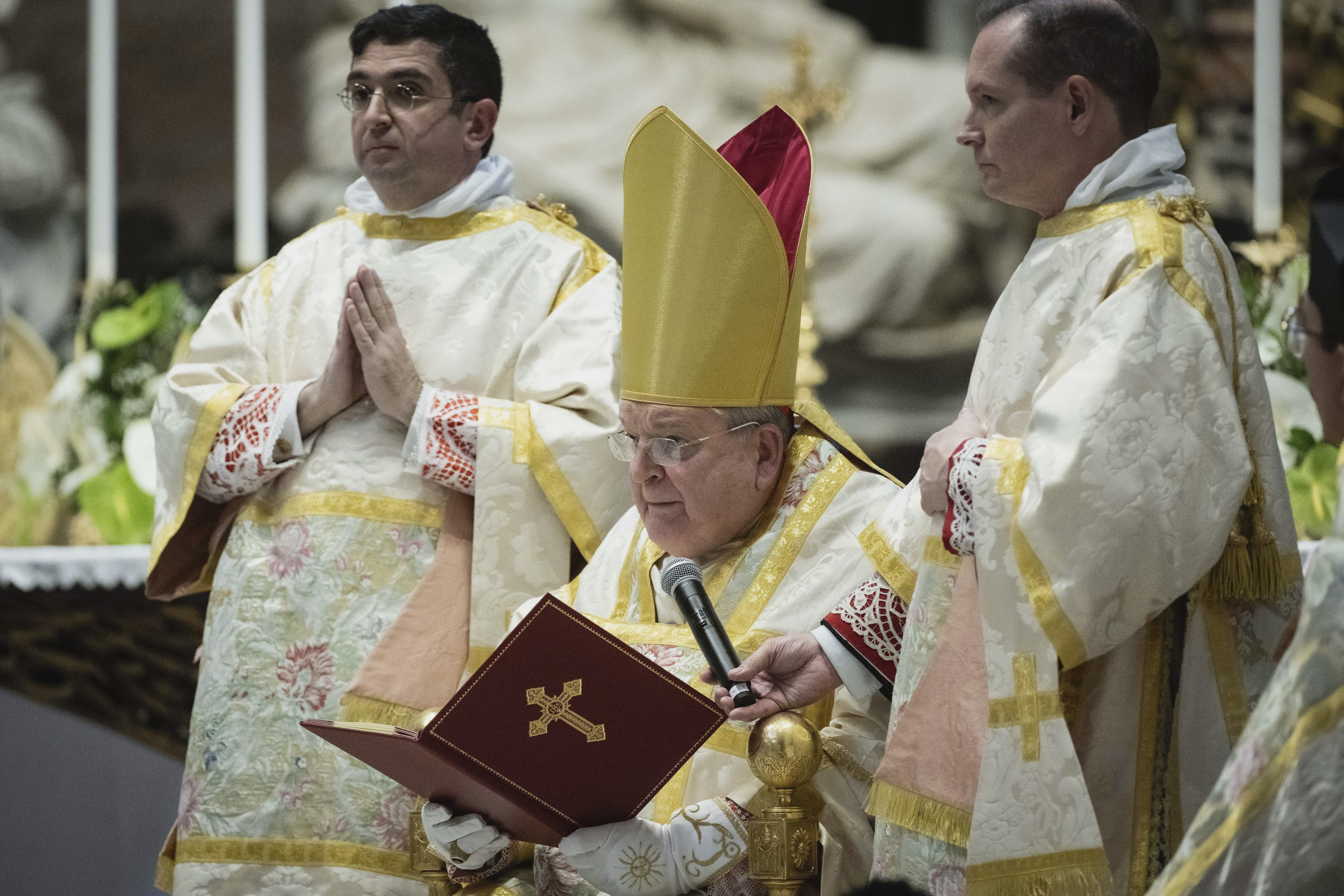 Cardinal celebrates Latin Mass at St. Peter's (Photos)